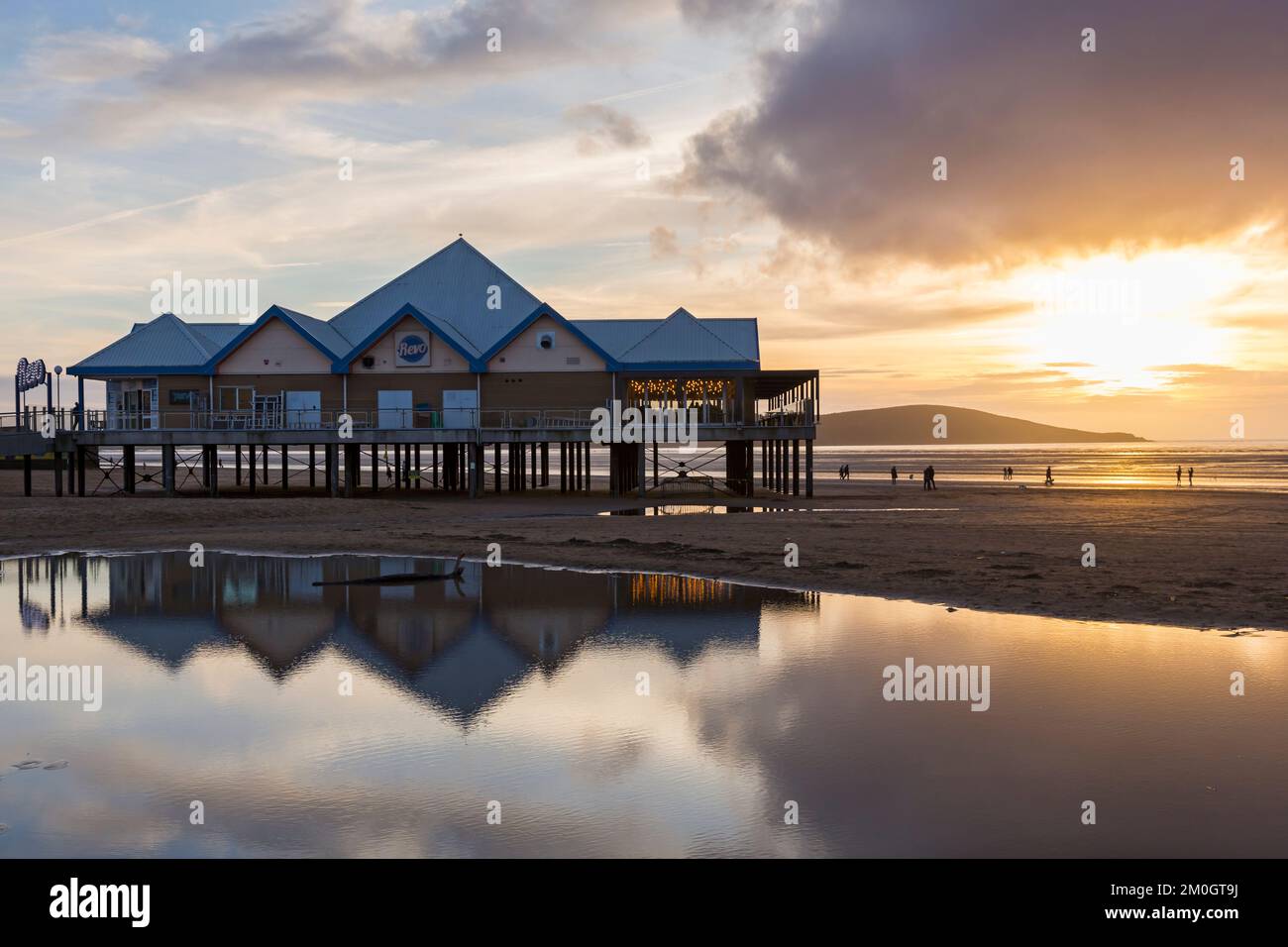 Revo kitchen and terrace reflected in sea water at Weston Super Mare ...
