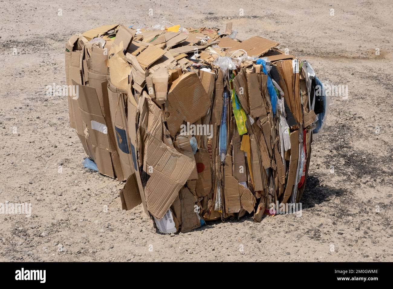 Waste paper pressed and packed for recycling. Compressed paper garbage ...