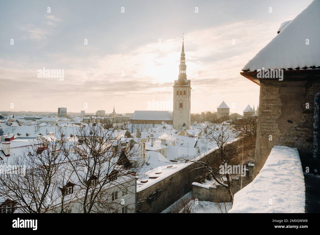 View of the roofs of the old town of Tallinn in winter.A snow-covered ...