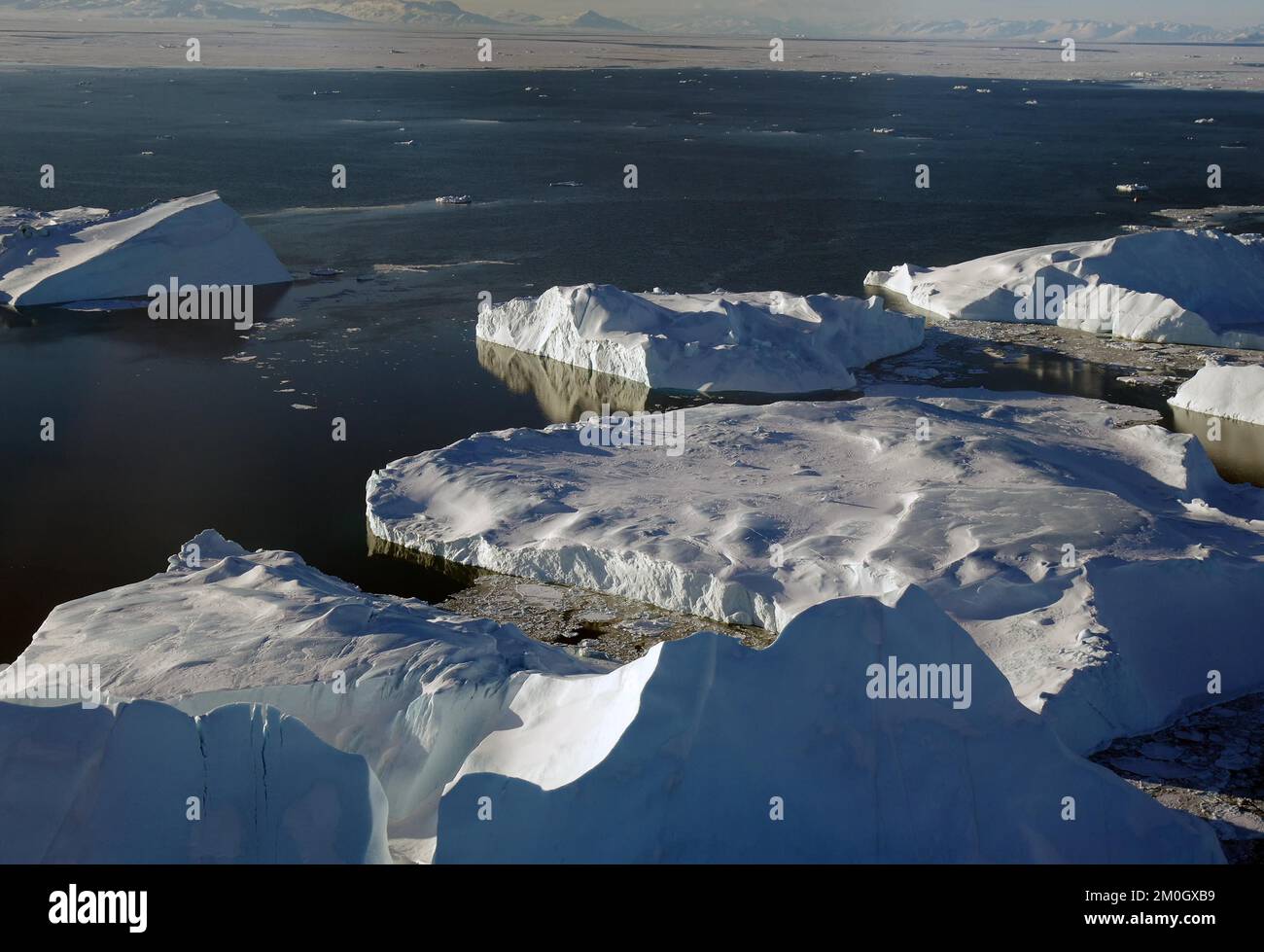 Giant icebergs from above, aerial view, winter, climate change, Disko ...