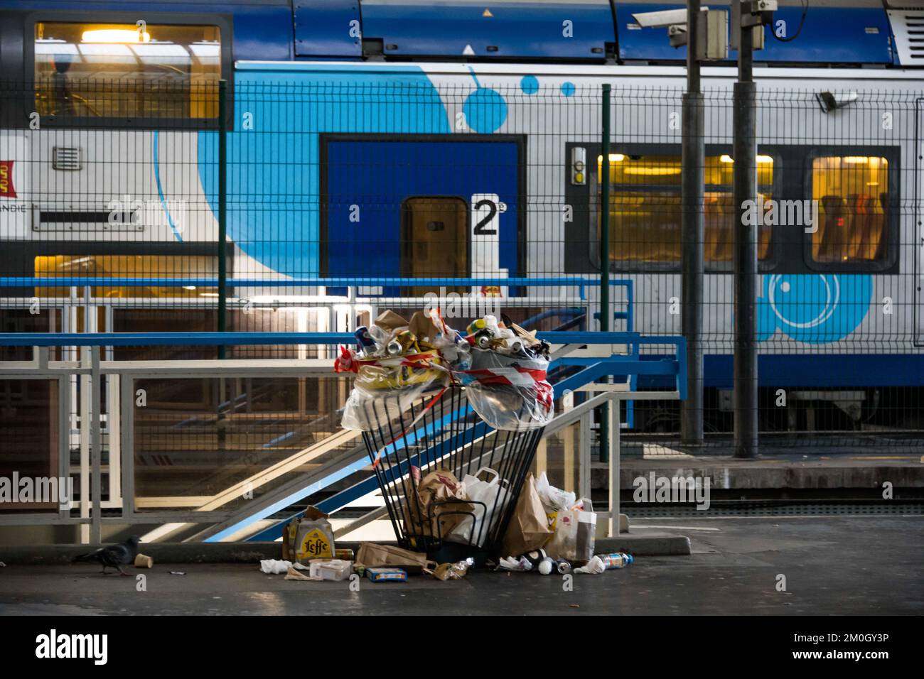 Garbage cans overflow on the platforms of the Paris Saint Lazare train ...