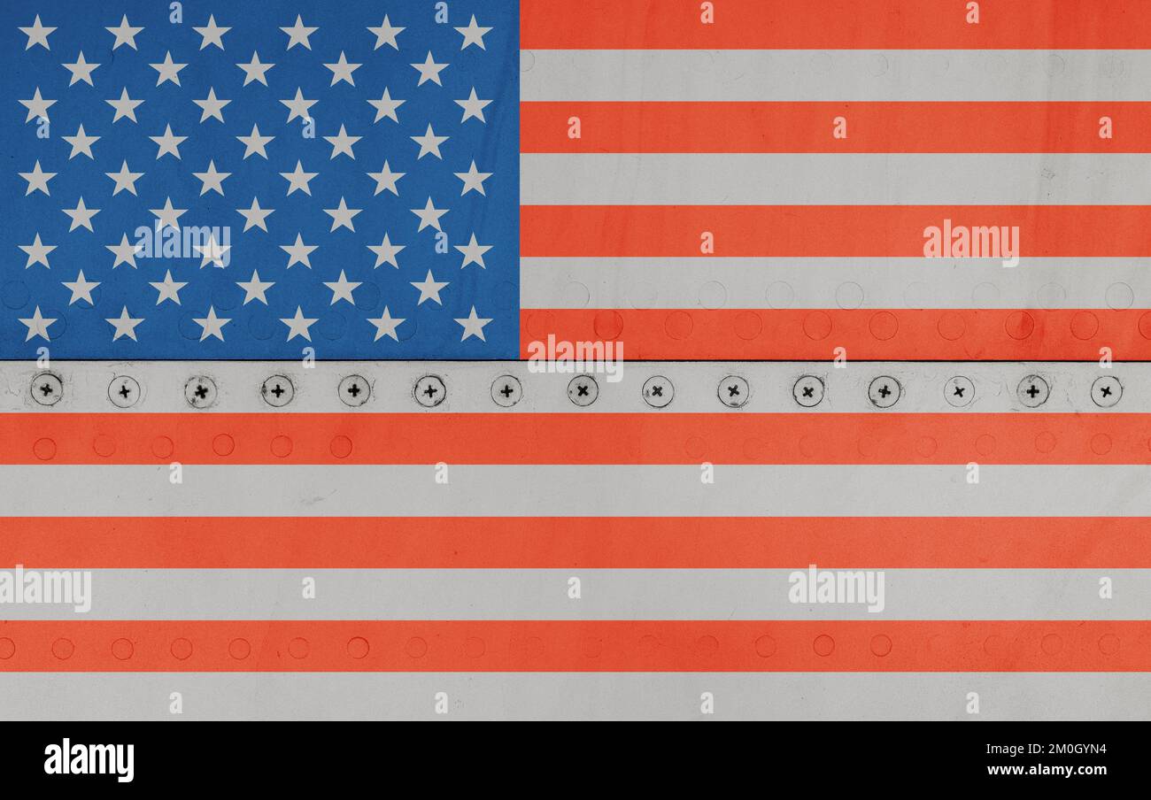 Grunge weathered national flag of USA over studded steel armor metal ...