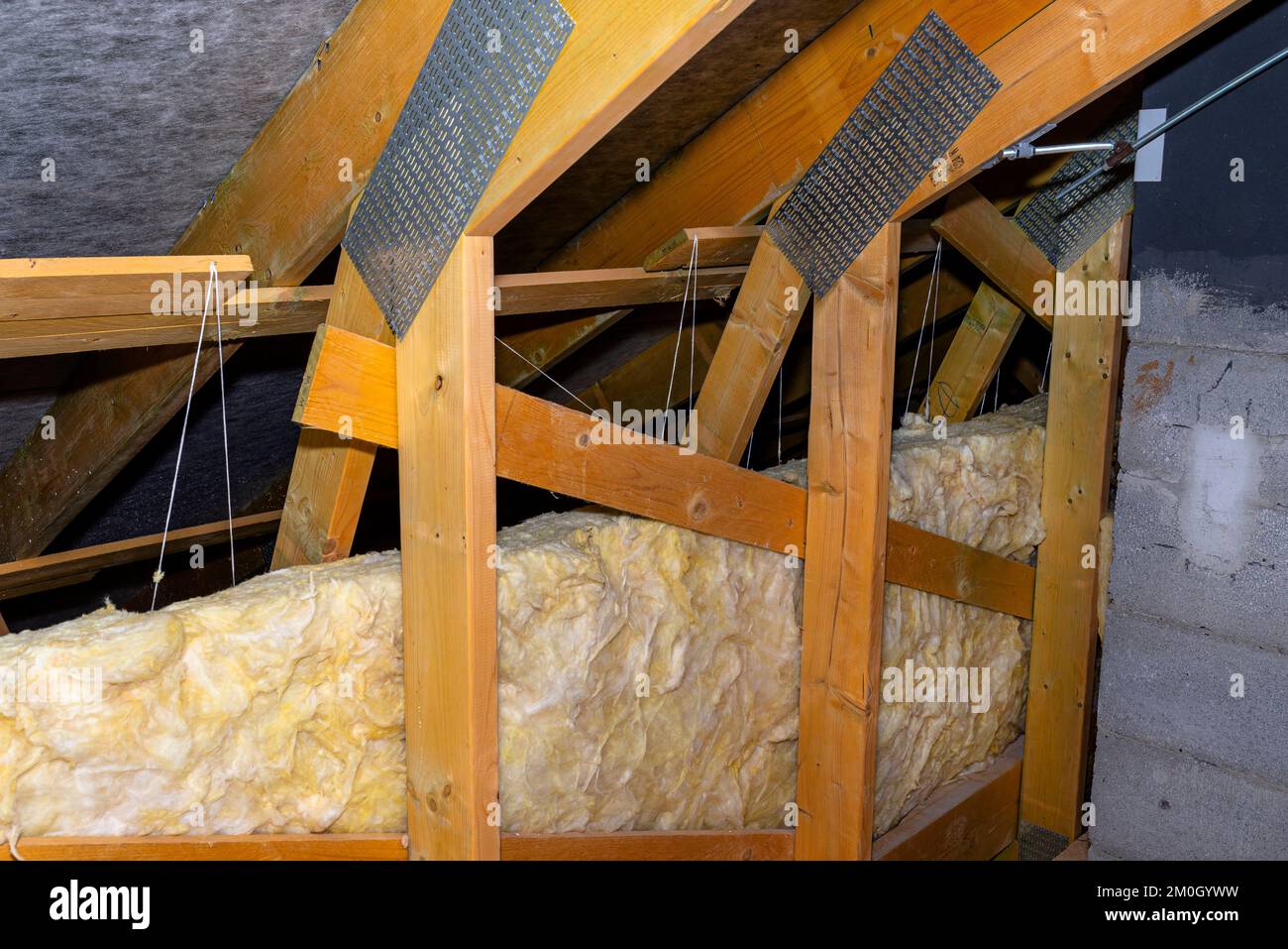 Insulation of walls and ceiling in the attic made of mineral wool ...