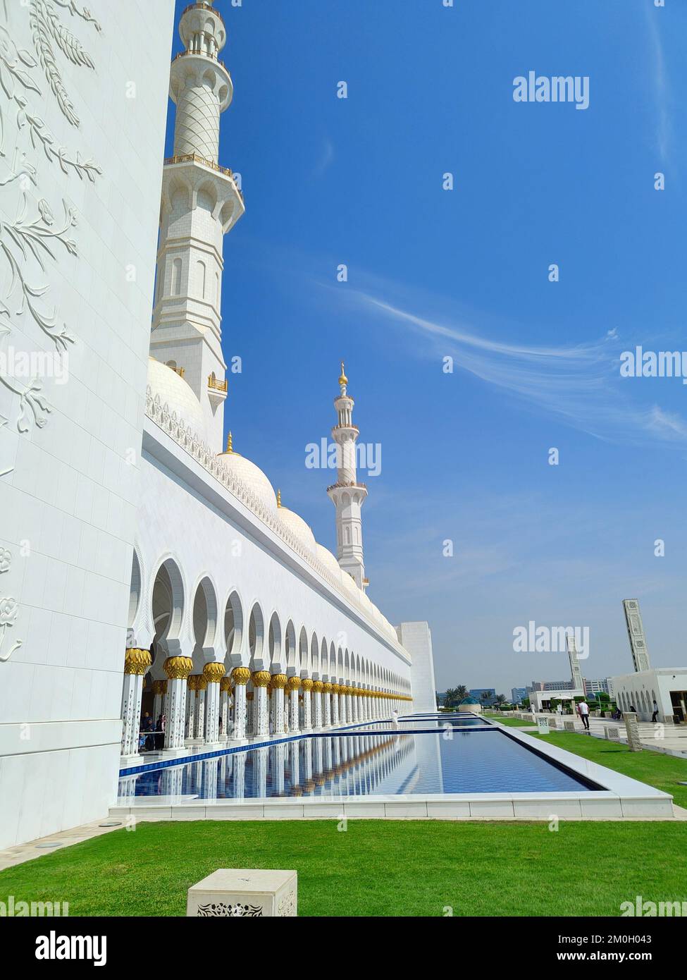 A vertical of the mesmerizing white walls of the Grand Mosque near ...