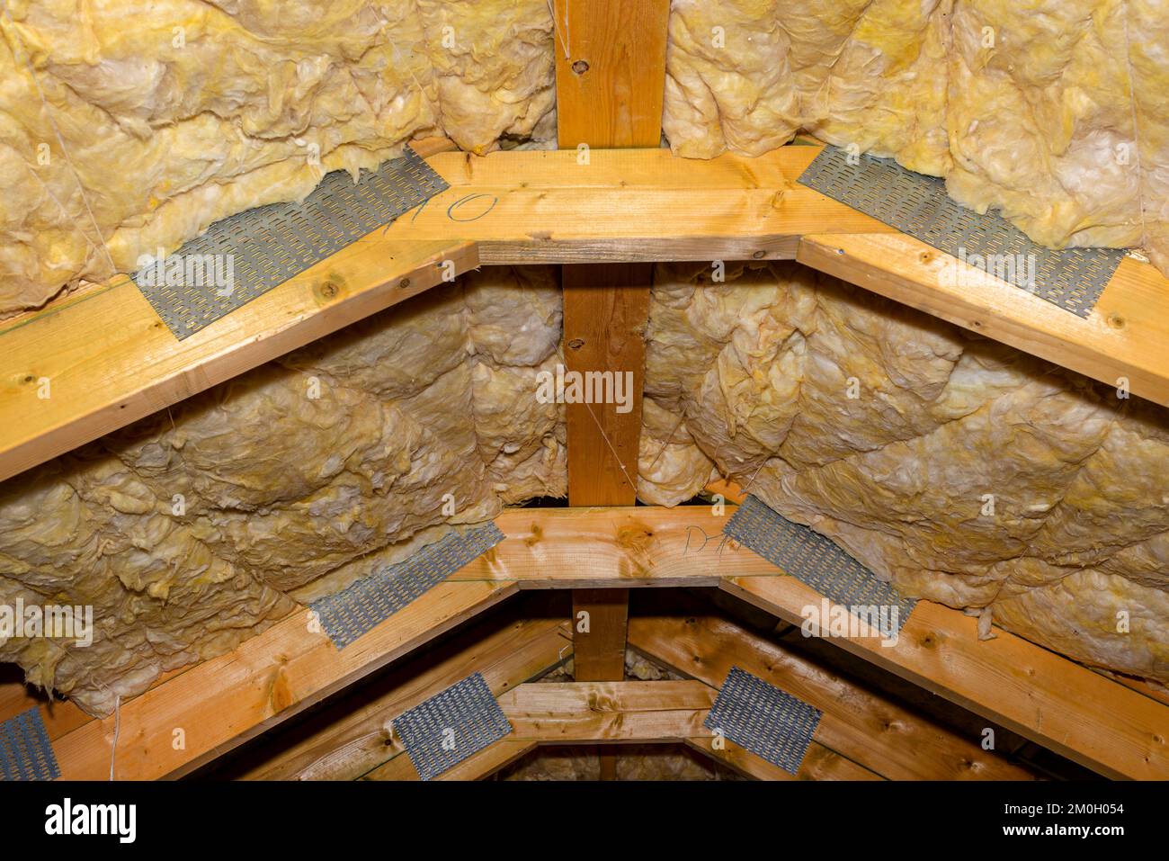Insulation of walls and ceiling in the attic made of mineral wool ...