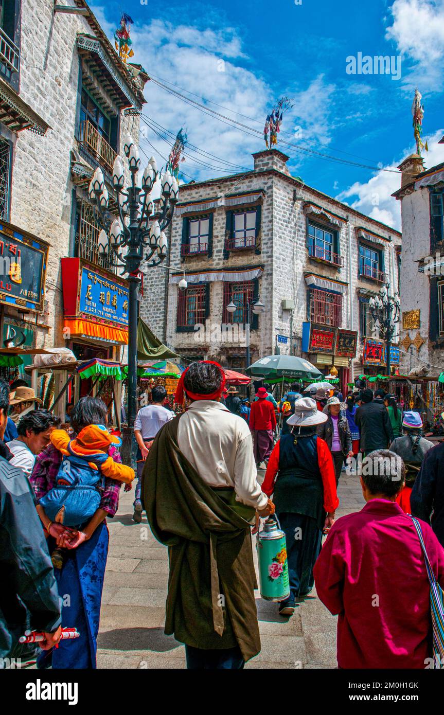 The Barkhor devotional circumambulation for pilgrims and locals, Lhasa ...