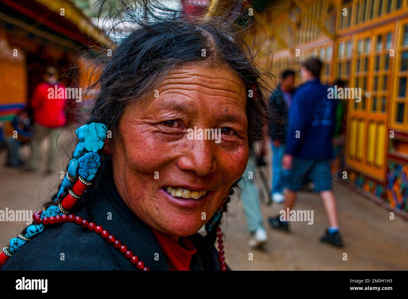 Old tibetan pilgrim in the Drepung temple, Lhasa, Tibet, Asia Stock ...