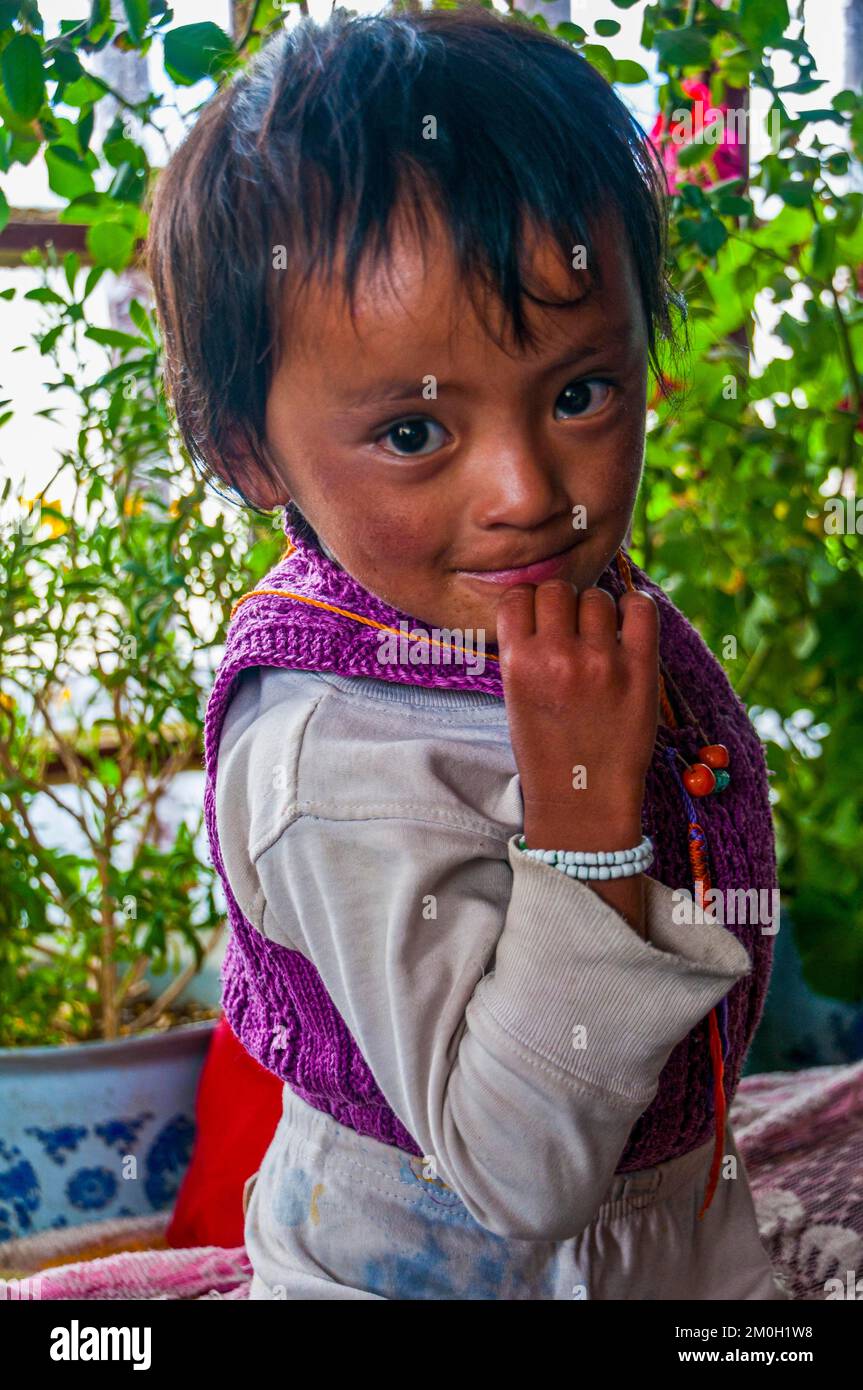 Young tibetan child in a guest house along the Kailash Kora, Western ...