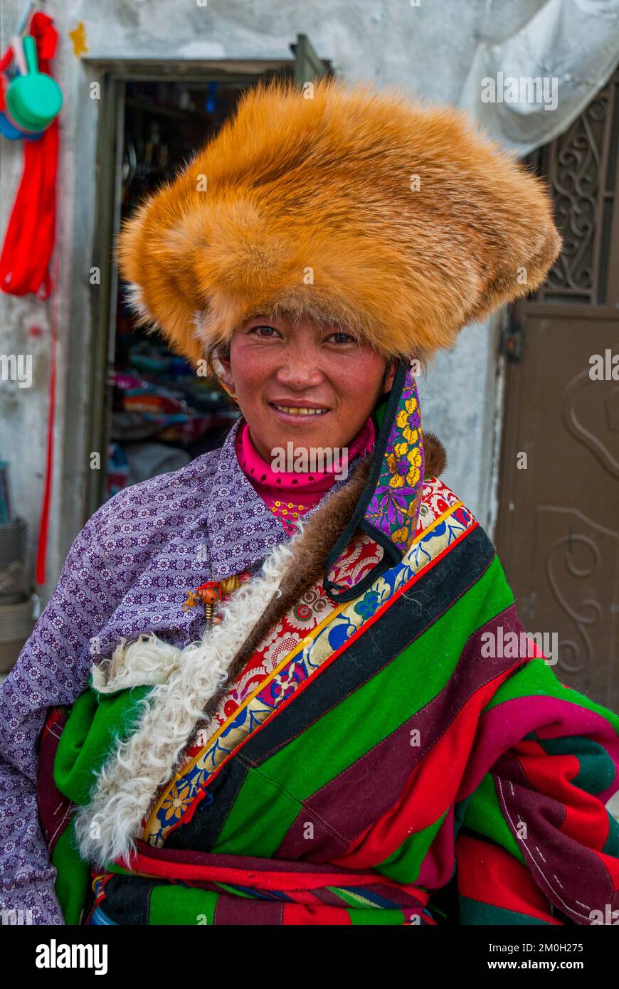 Traditional dressed woman in the town of Tsochen, West Tibet, Asia ...
