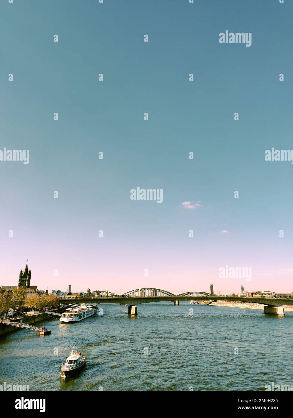 A vertical shot of the Hohenzollern bridge over river Rhine, Cologne ...
