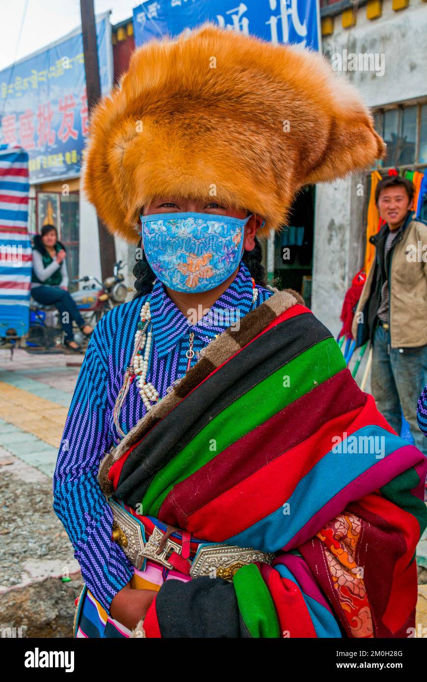 Traditional dressed woman in the town of Tsochen, West Tibet, Asia ...