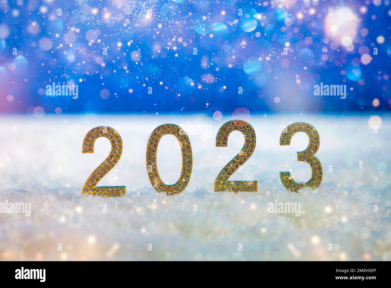 Happy New Year 2023. Beautiful snowy Christmas background with golden ...