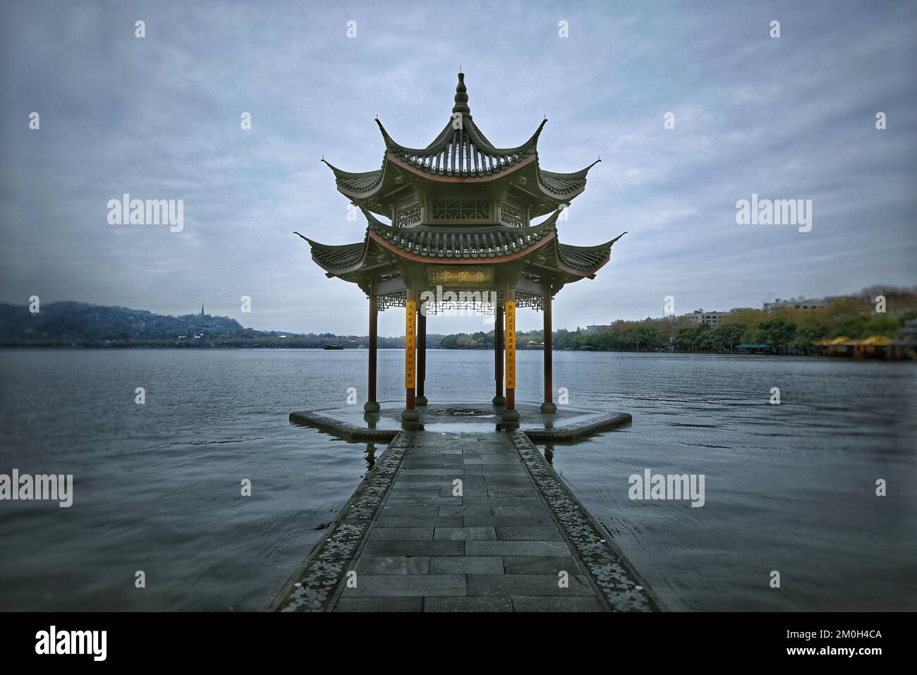 An ancient jixian pavilion at Xi lake on a gloomy day Hangzhou, China ...