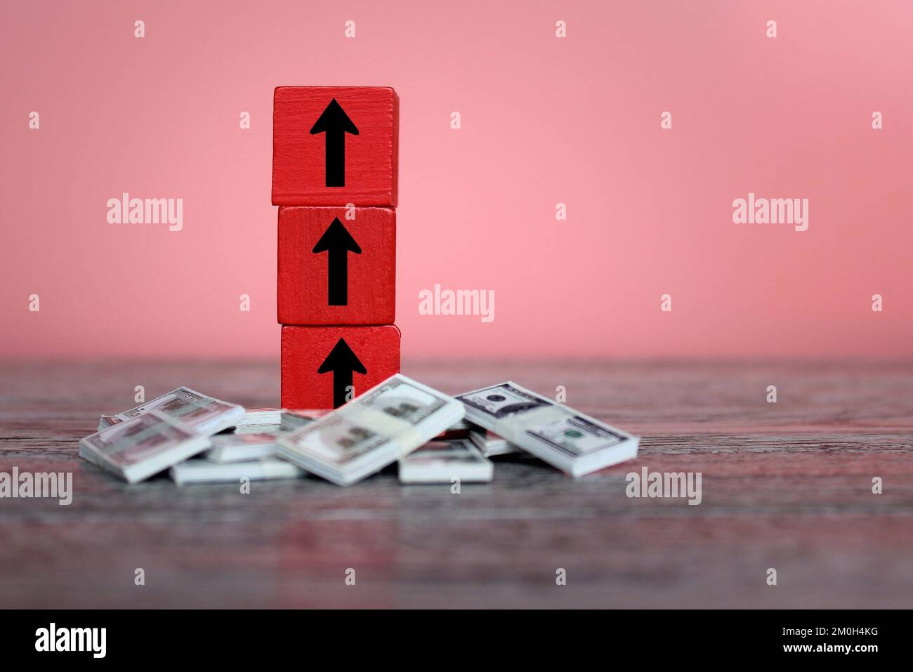 Upward arrows and stack of money. Inflation, rising cost of living ...