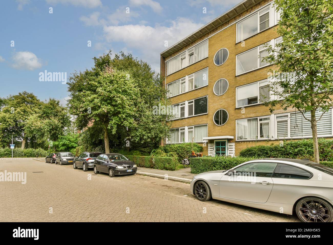 View of street near building with beauty of vegetation outside Stock ...