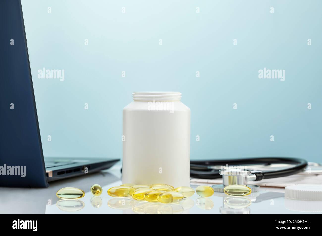 Mockup of natural bio pills, vitamins or supplements on doctor desk on ...