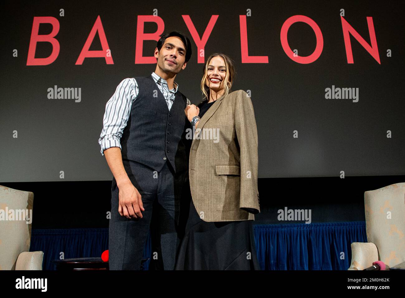 Diego Calva and Margot Robbie pose onstage at the San Rafael Film ...