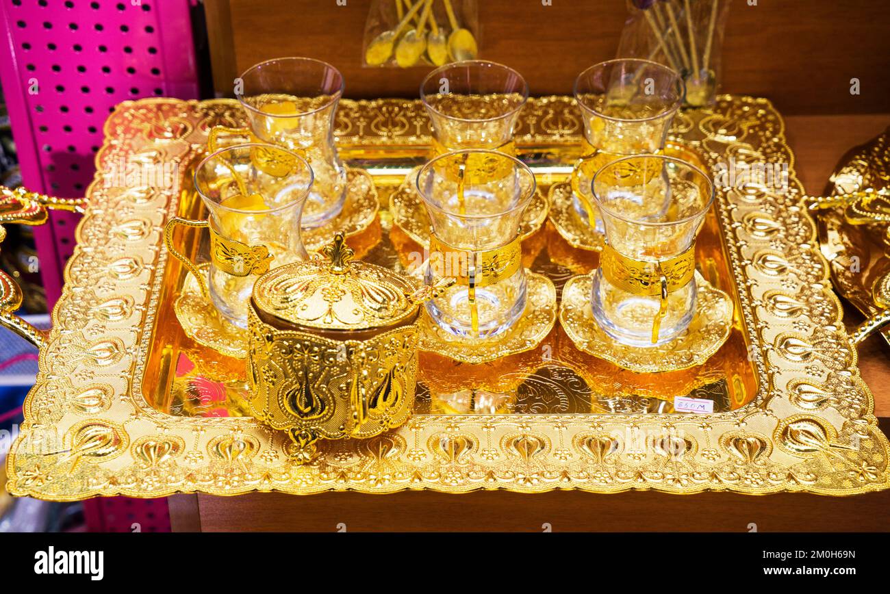 Oriental, Turkish, Arabic gilded tea set, glasses on a tray on a shop ...