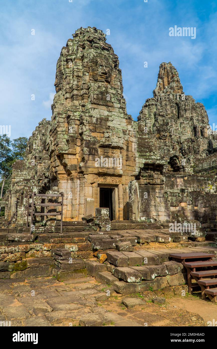 A vertical shot of the Bayon Temple inside Angkor Wat complex in ...