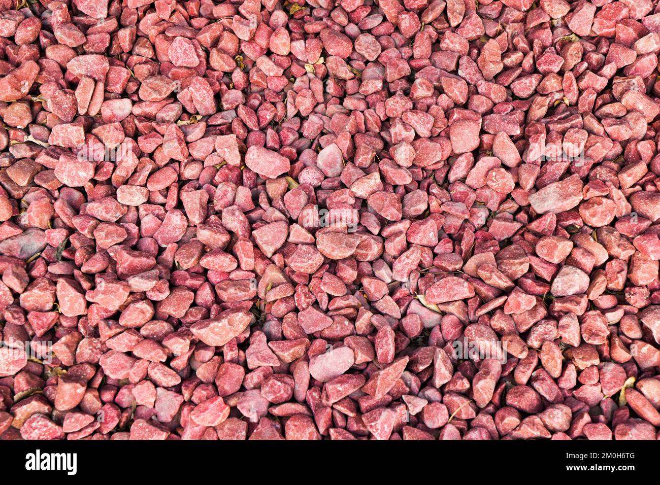 Red stones gravel texture macro background, decor Stock Photo - Alamy