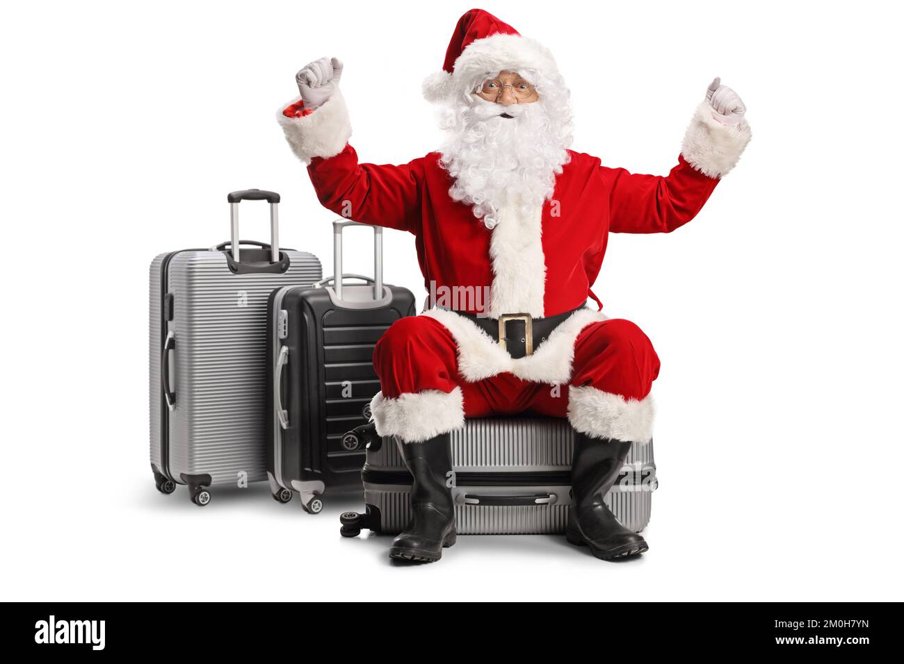 Happy santa claus sitting on a suitcase isolated on white background ...
