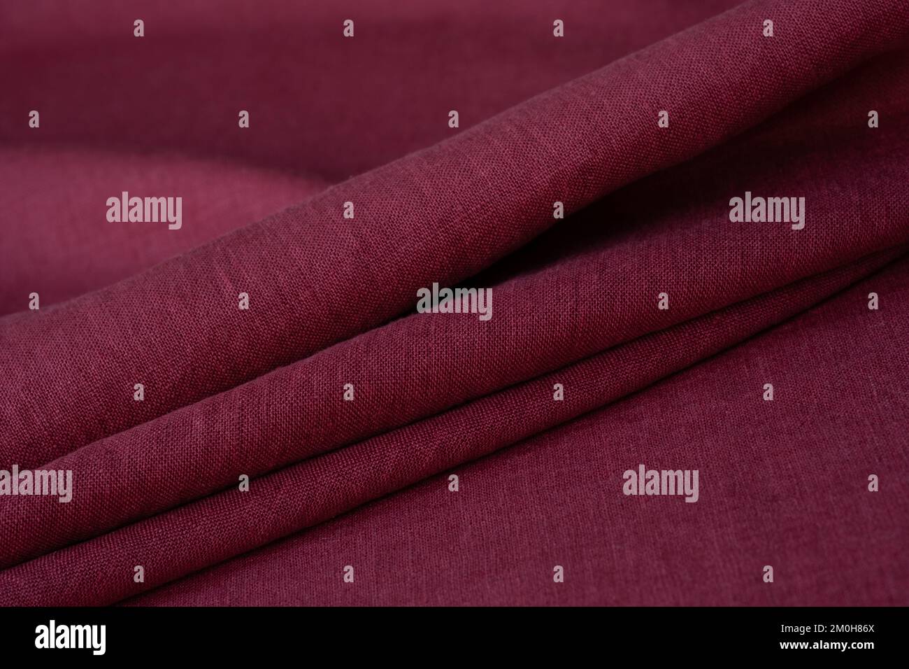 Wrinkled marron linen cloth folded napkins. Linen fabric texture ...