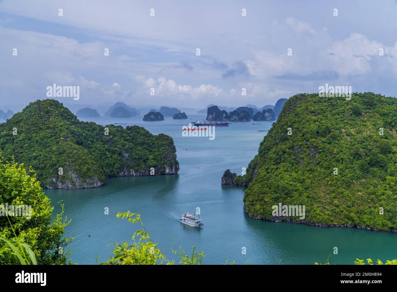 Scenic Ha Long Bay under the cloudy sky, Vietnam Stock Photo - Alamy