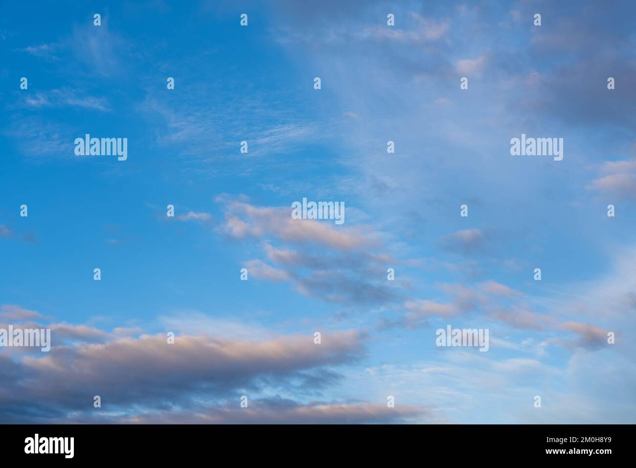 Beautiful sunset or sunrise sky, illuminating dark blue and pale pink ...