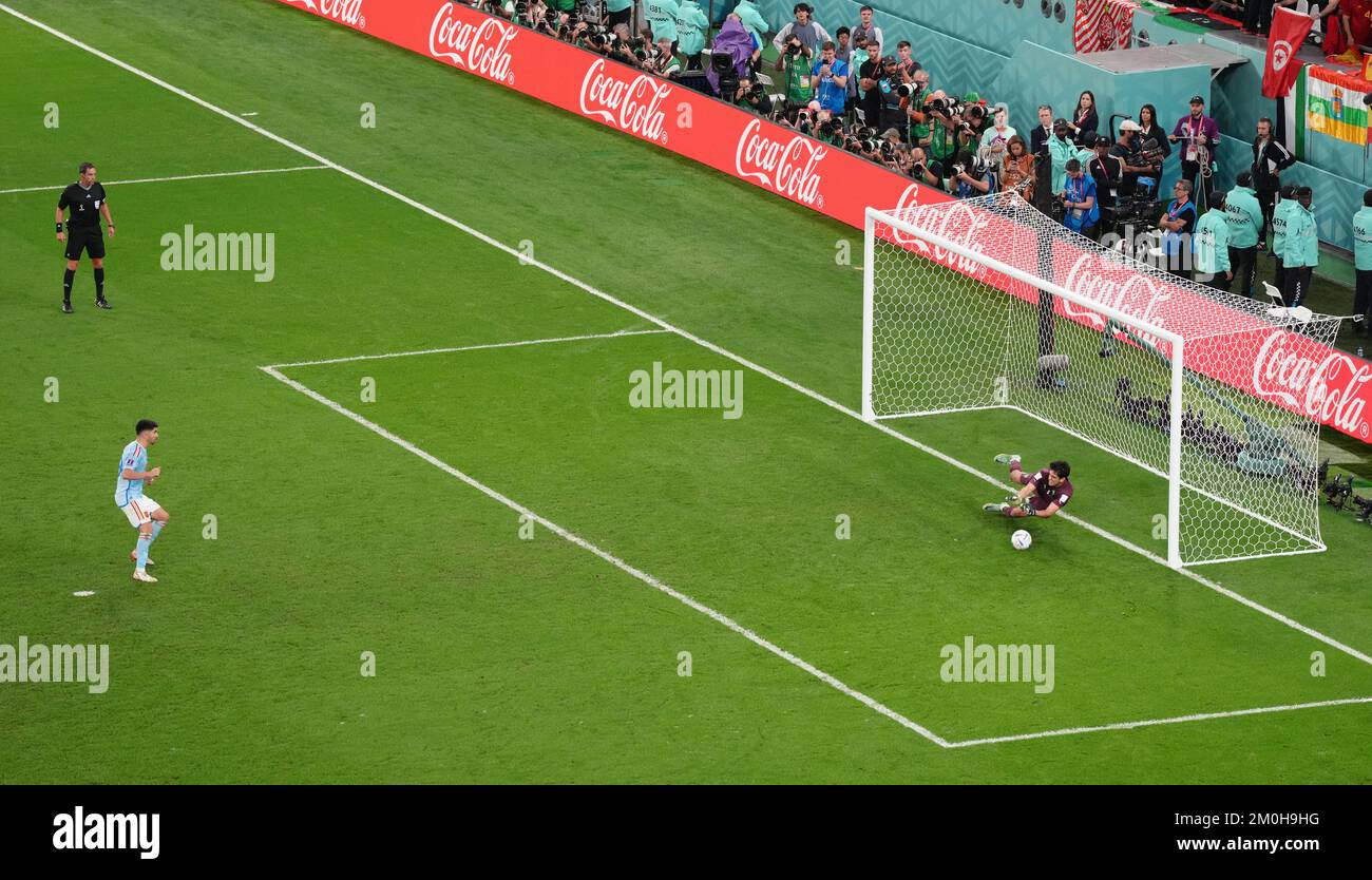 Morocco goalkeeper Yassine Bounou saves from Spain's Carlos Soler ...