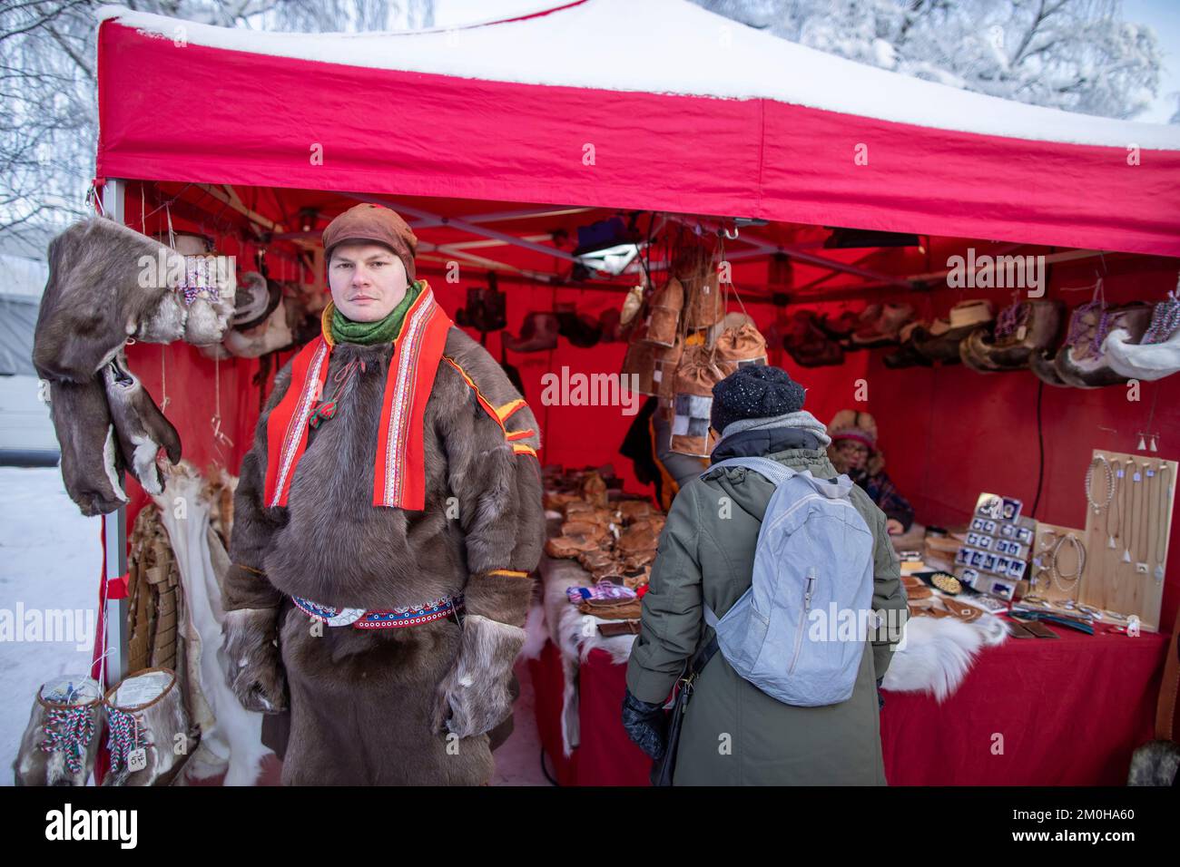 Sweden, Norbotten County, Jokkmokk, Sami fur trapper presenting his ...