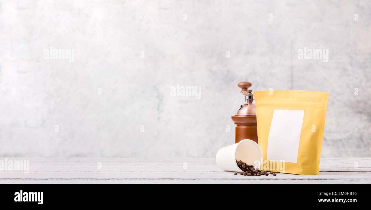 Coffee packaging mockup. Paper coffee bag and coffee beans isolated on ...