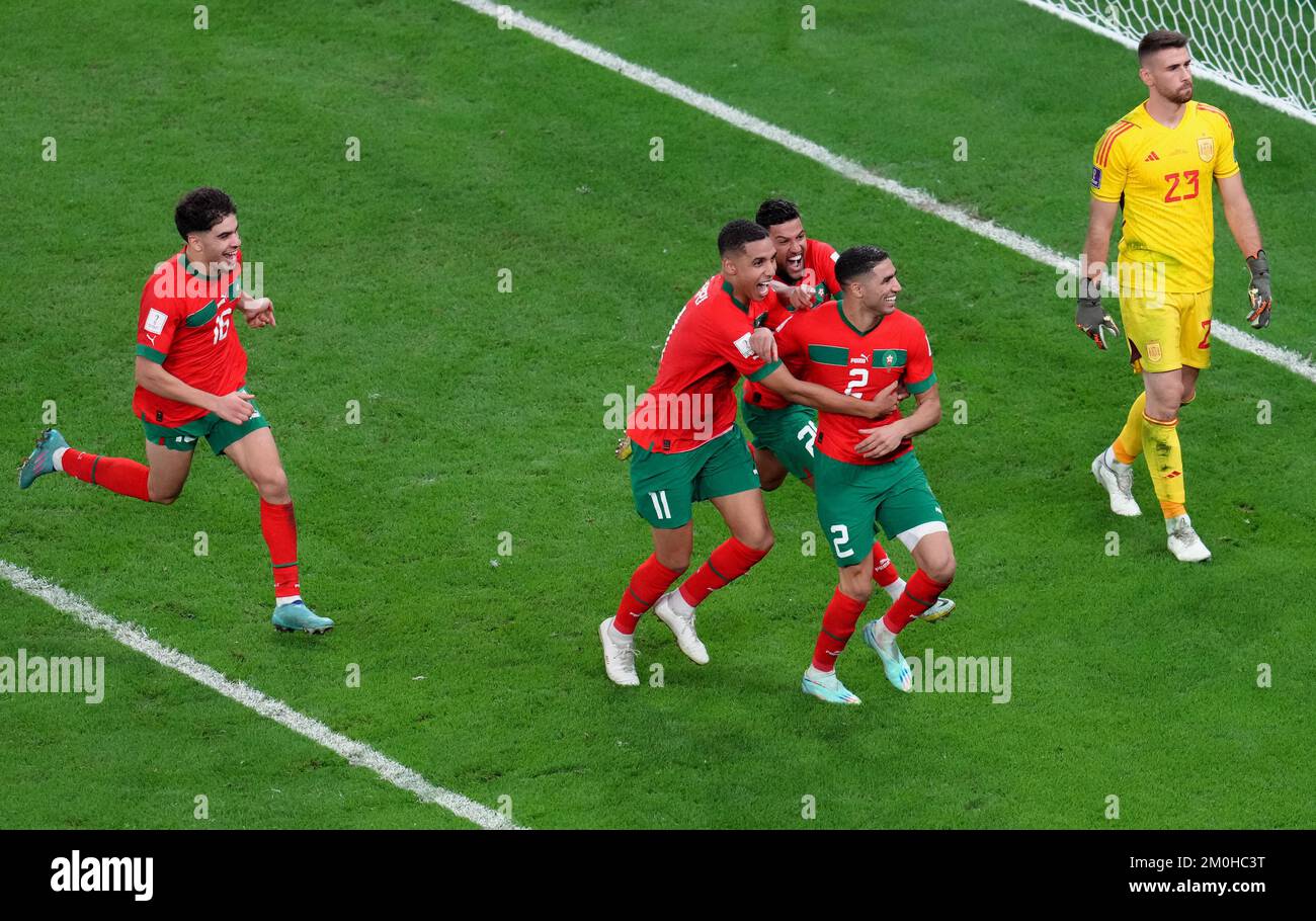 Morocco's Achraf Hakimi (second right) and team-mates celebrate winning ...
