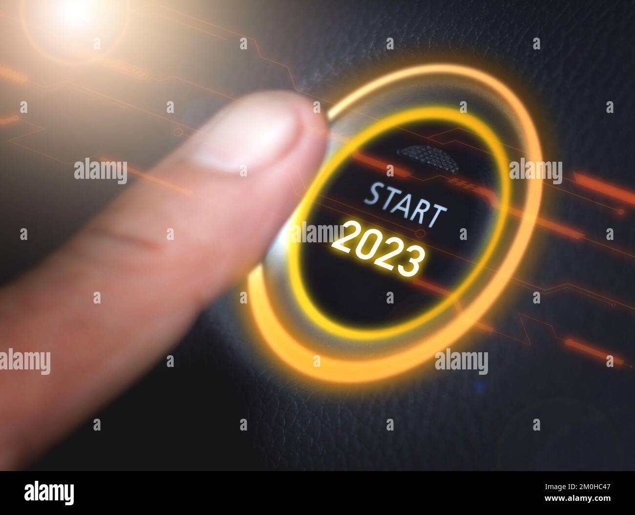 Finger pressing a 2023 start button. Concept of new year, two thousand ...