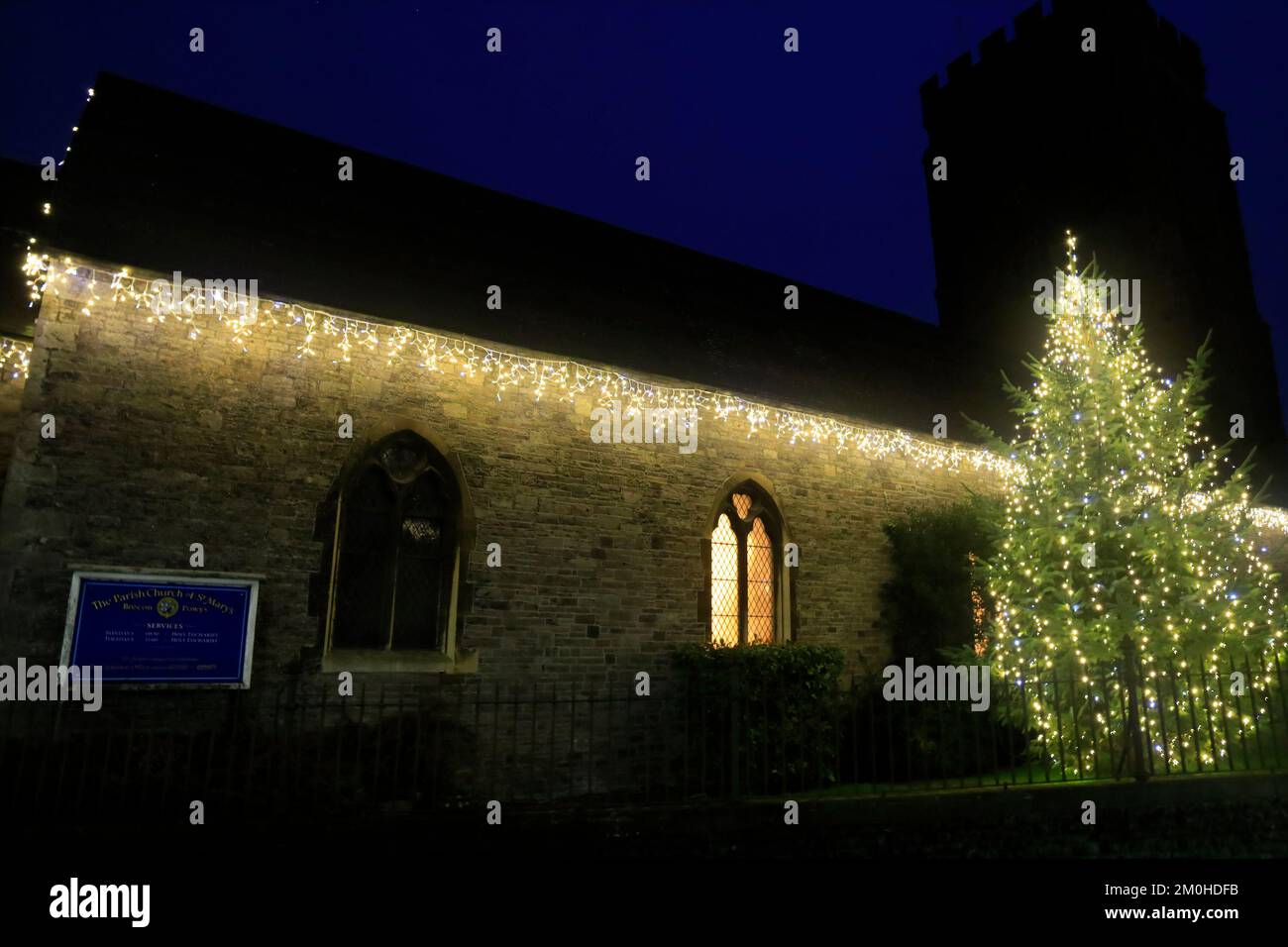 St Mary's church, Brecon town, with tree and lights decorated for ...