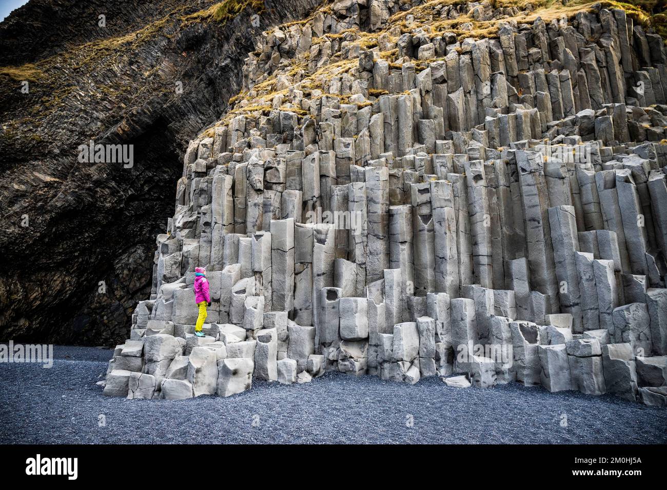 Iceland, Sudurland region, Reynisfjara beach, geometric basalt columns ...