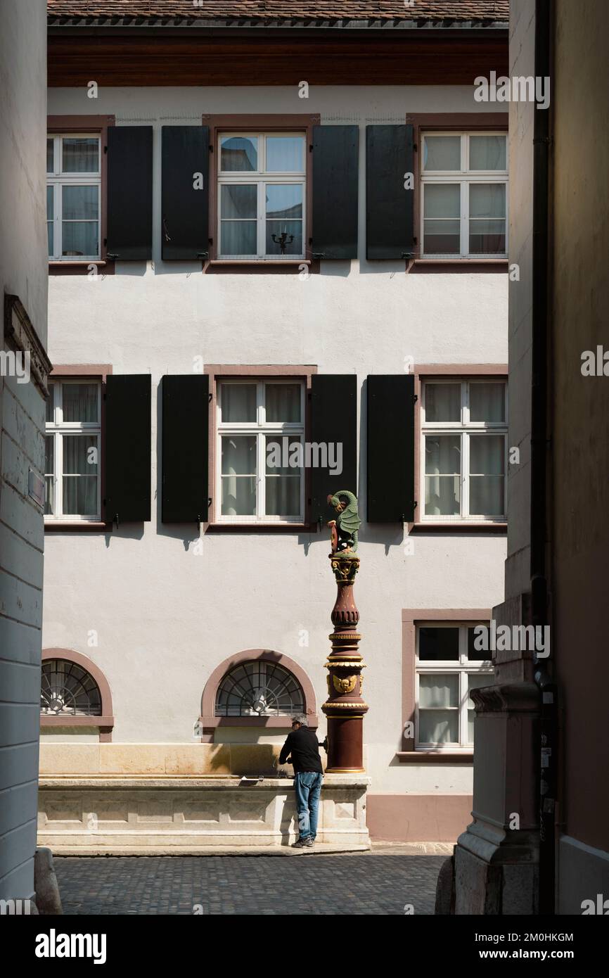 Switzerland, Basel, Old Basel, Augustinergasse, fountain surmounted by ...