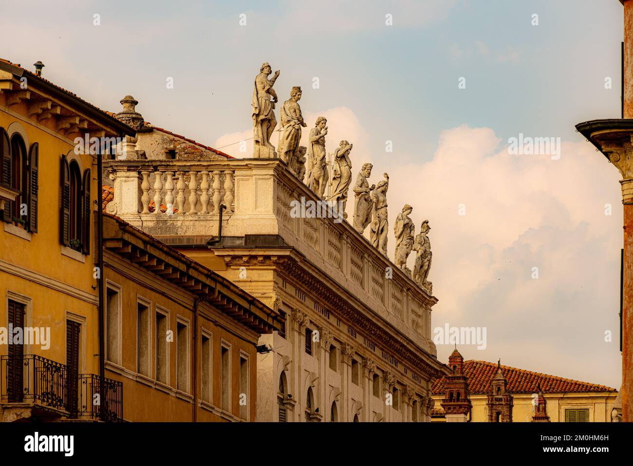 A closeup of sculptures on top of Canossa Palace (Palazzo Canossa) in ...