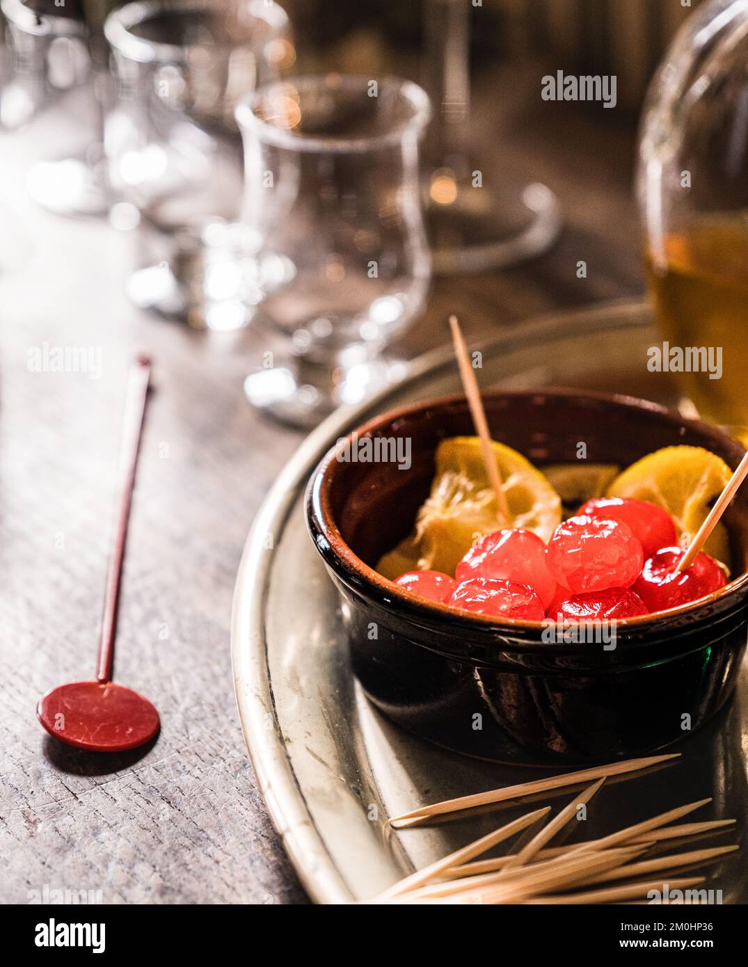 1960s style cocktail cherries and sticks at an English country house in ...