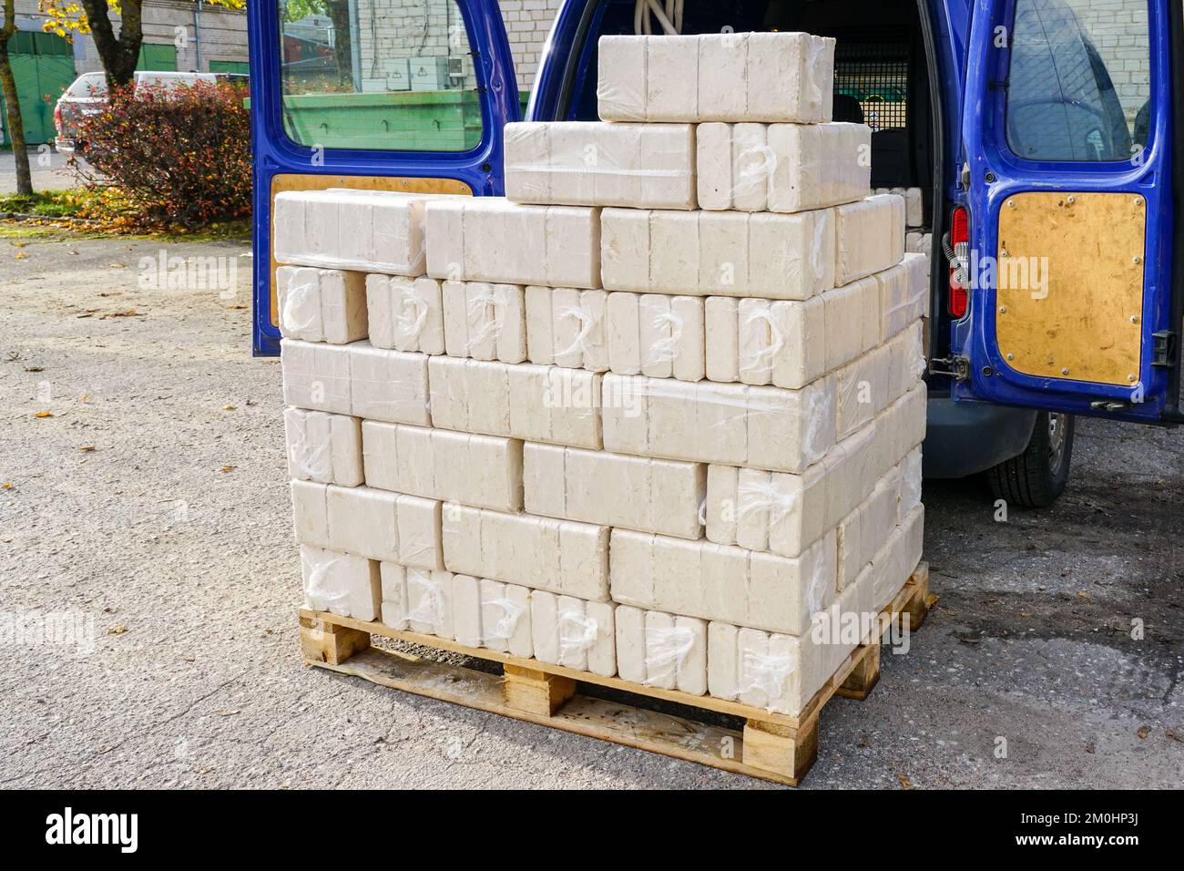 Pallet with alternative fuel, bio fuel. Purchased packed eco briquettes ...