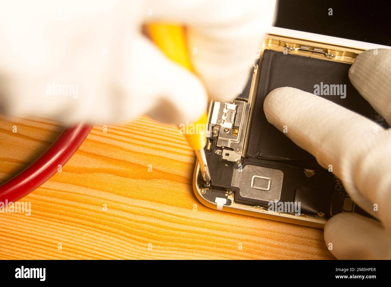 Top view of a technician repairing a smartphone Stock Photo - Alamy