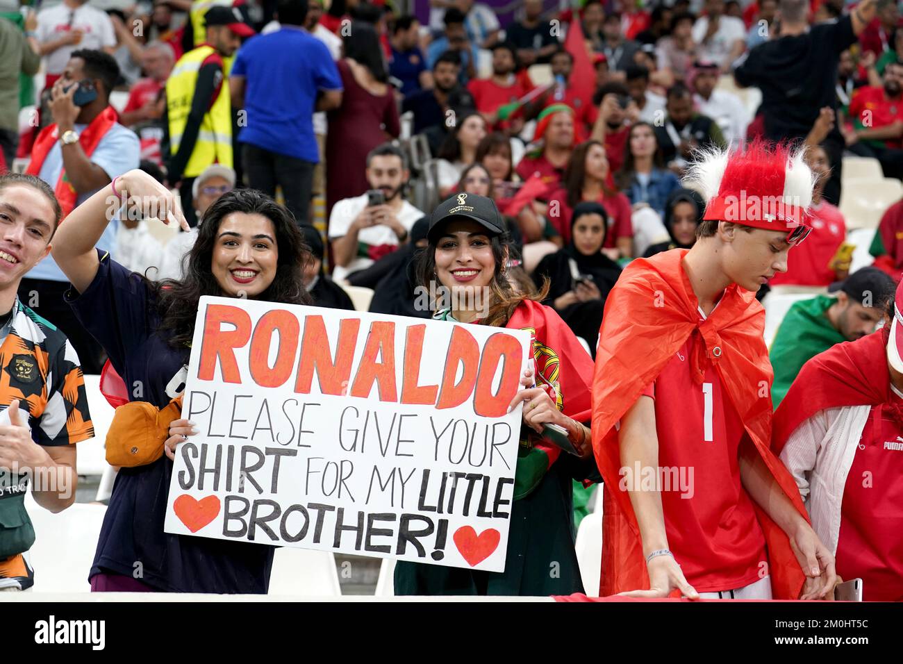 Portugal fans hold a cristiano ronaldo sign in the stands hi-res stock ...