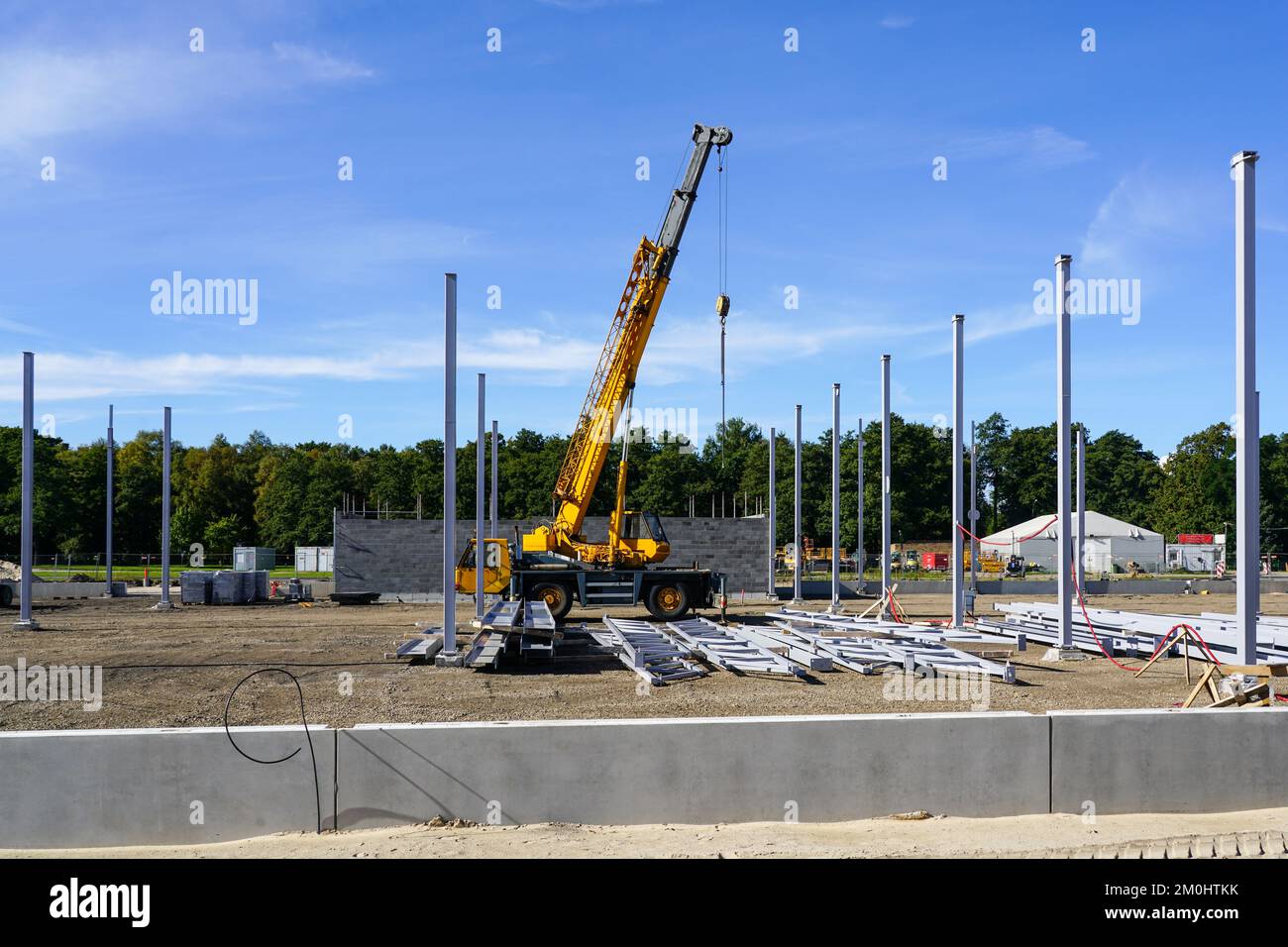 Construction site of a new modern industrial building with vertical ...