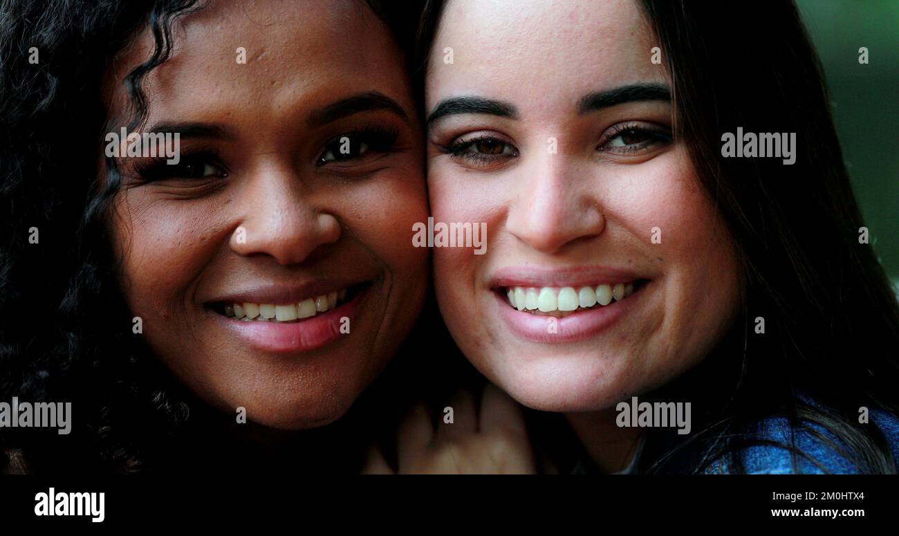 Diverse women smiling cheek to cheek, diversity concept, happy people ...