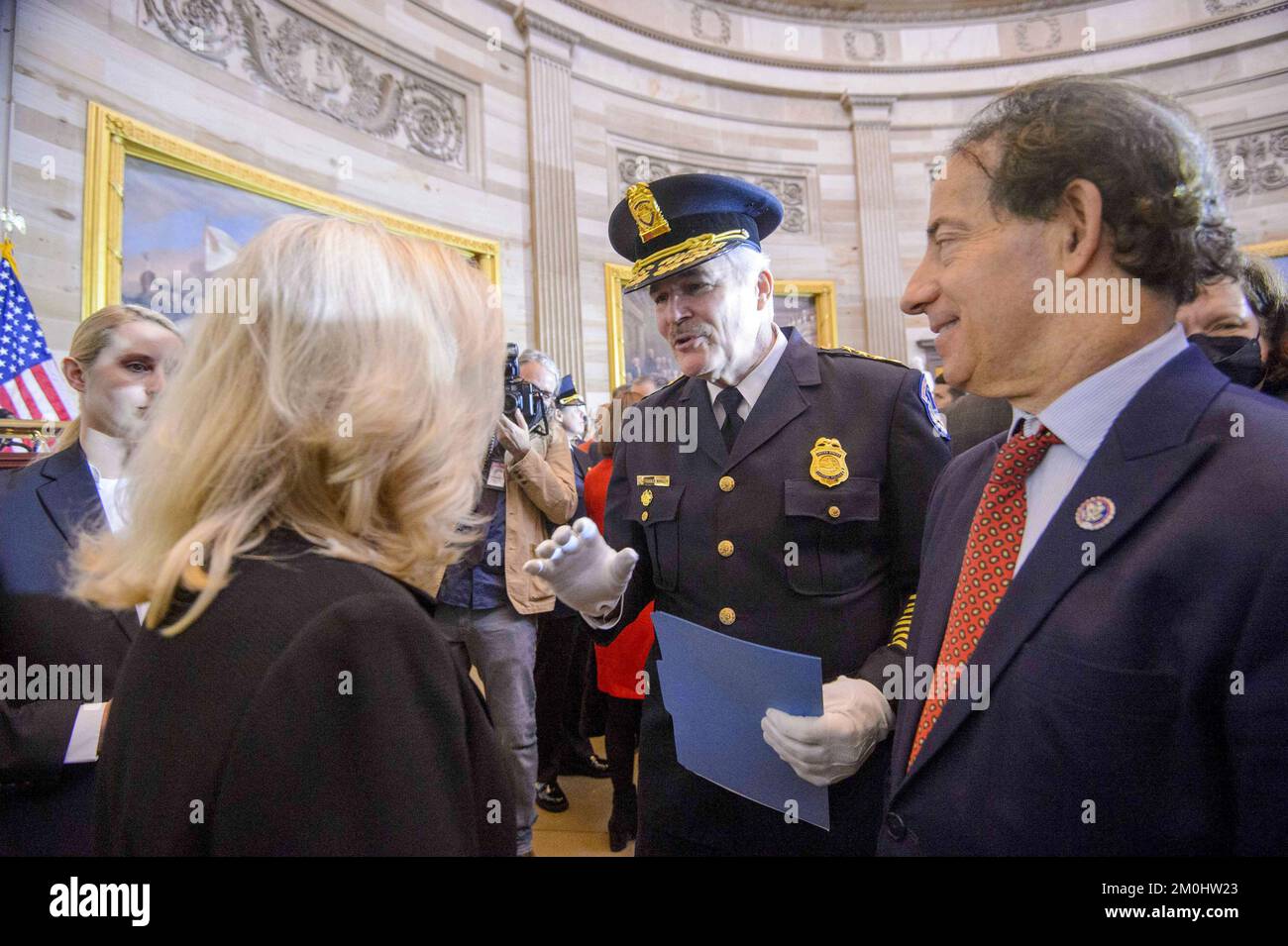 U.S. Capitol Police Chief Tom Manger (C) talks with Rep. Liz Cheney, D ...
