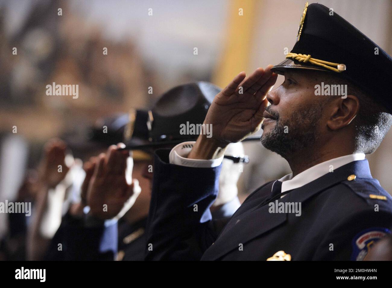 Members of the U.S. Capitol Police and D.C. Metropolitan Police salute ...