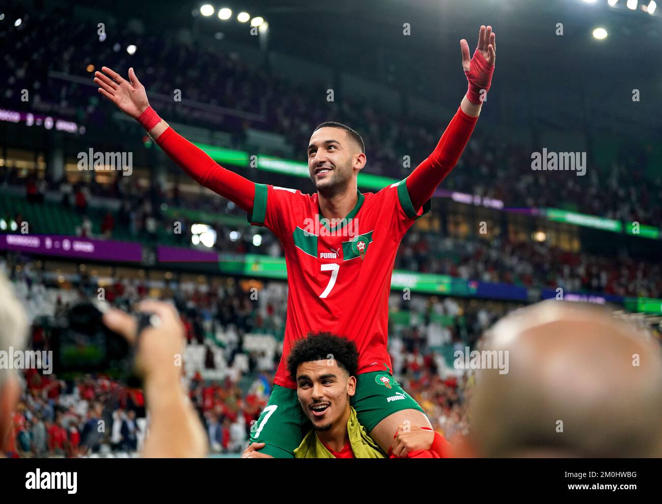 Morocco's Zakaria Aboukhlal (bottom) and Hakim Ziyech celebrate after ...