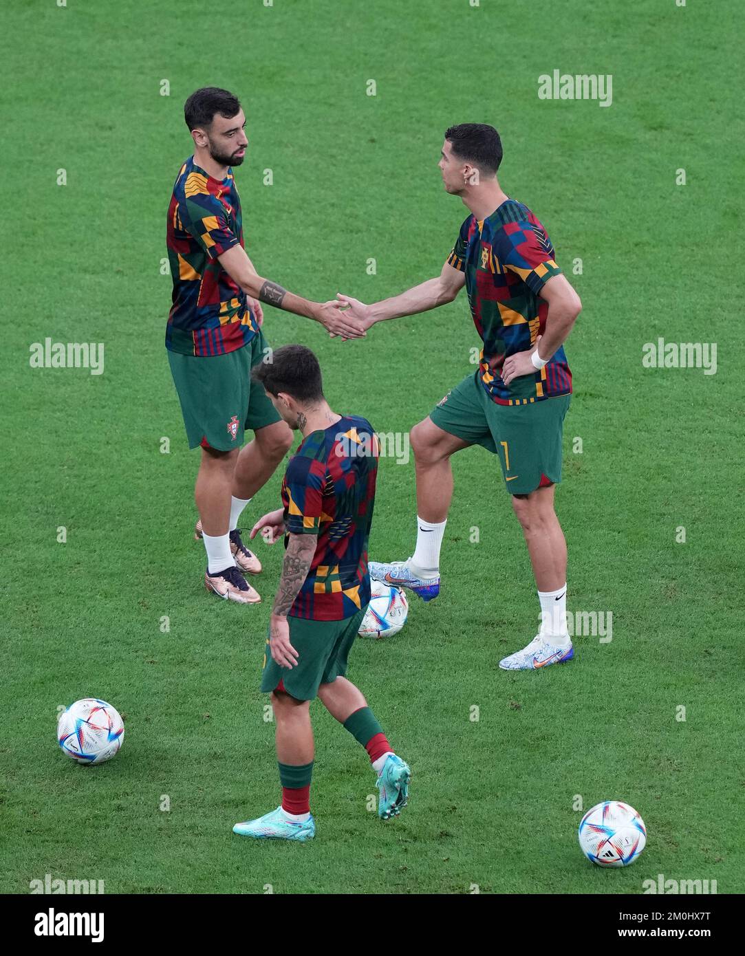 Portugal's Cristiano Ronaldo (centre) shakes hands with Portugal's ...