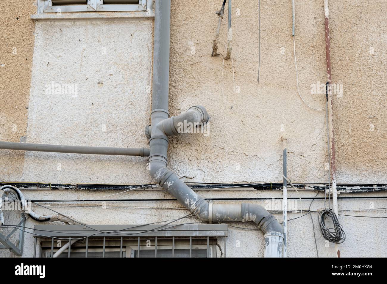 Plumbing installation of water pipe and sewerage system on the building ...