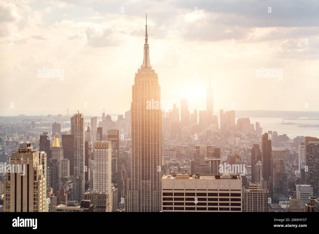 View of a lonely skyscraper in the rays of the rising sun Stock Photo ...
