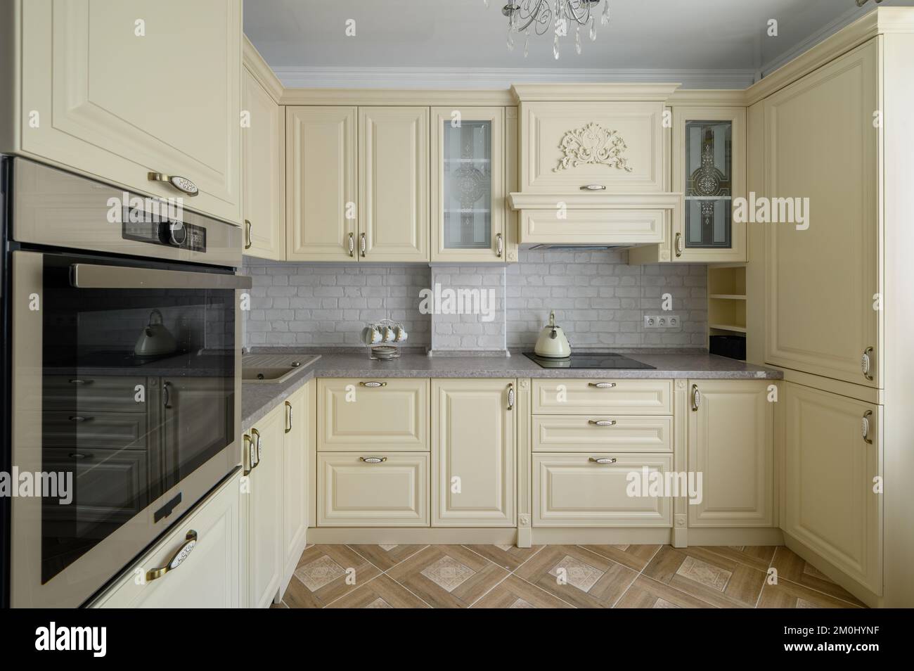 Interior of modern trendy cream colored kitchen Stock Photo - Alamy